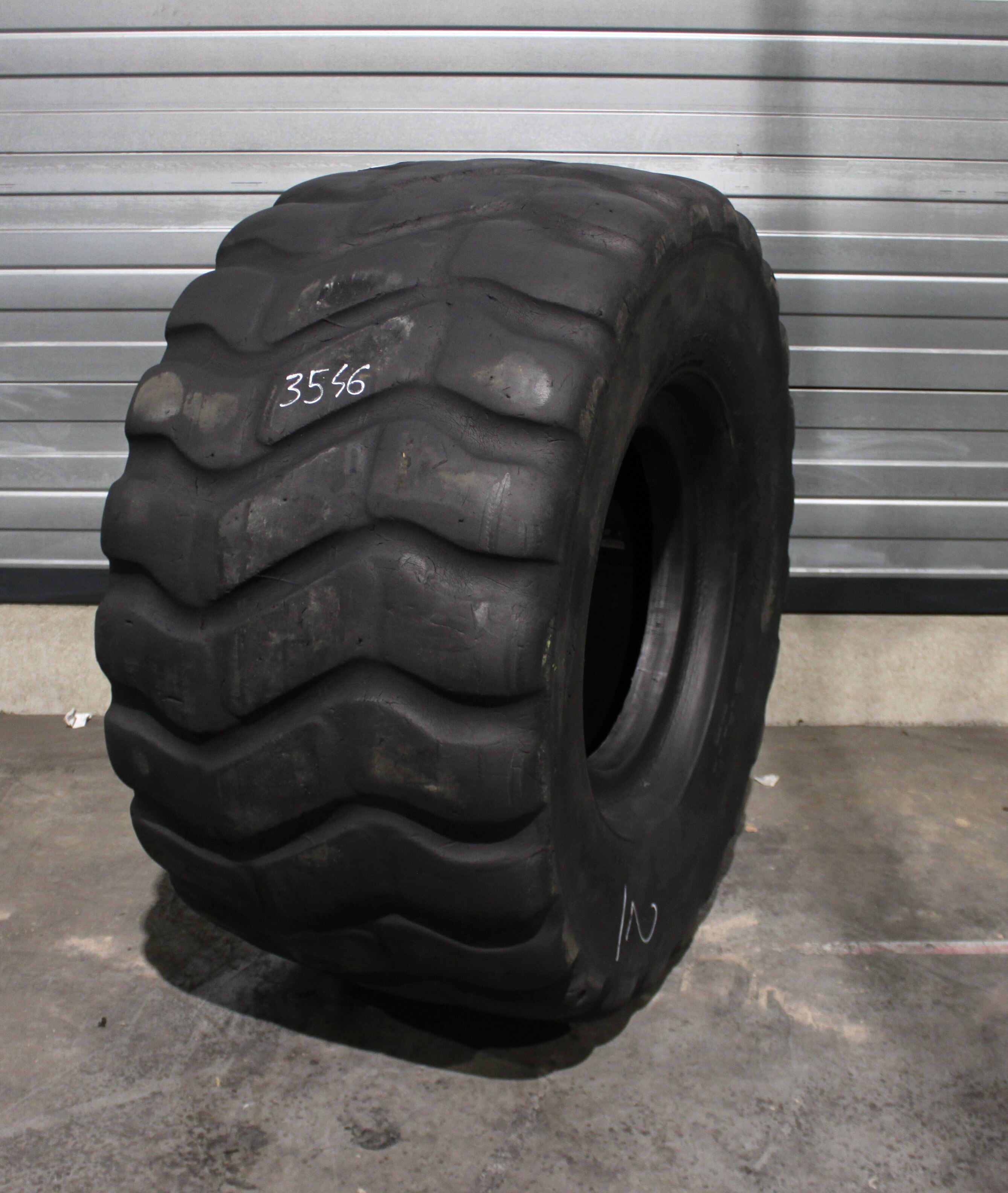 750/65R25 USED GOODYEAR TL-3A+ 202A2 ** E-3/L-3 TL 15MM 32% 1 REP + COSM REP 3546 | Heuver