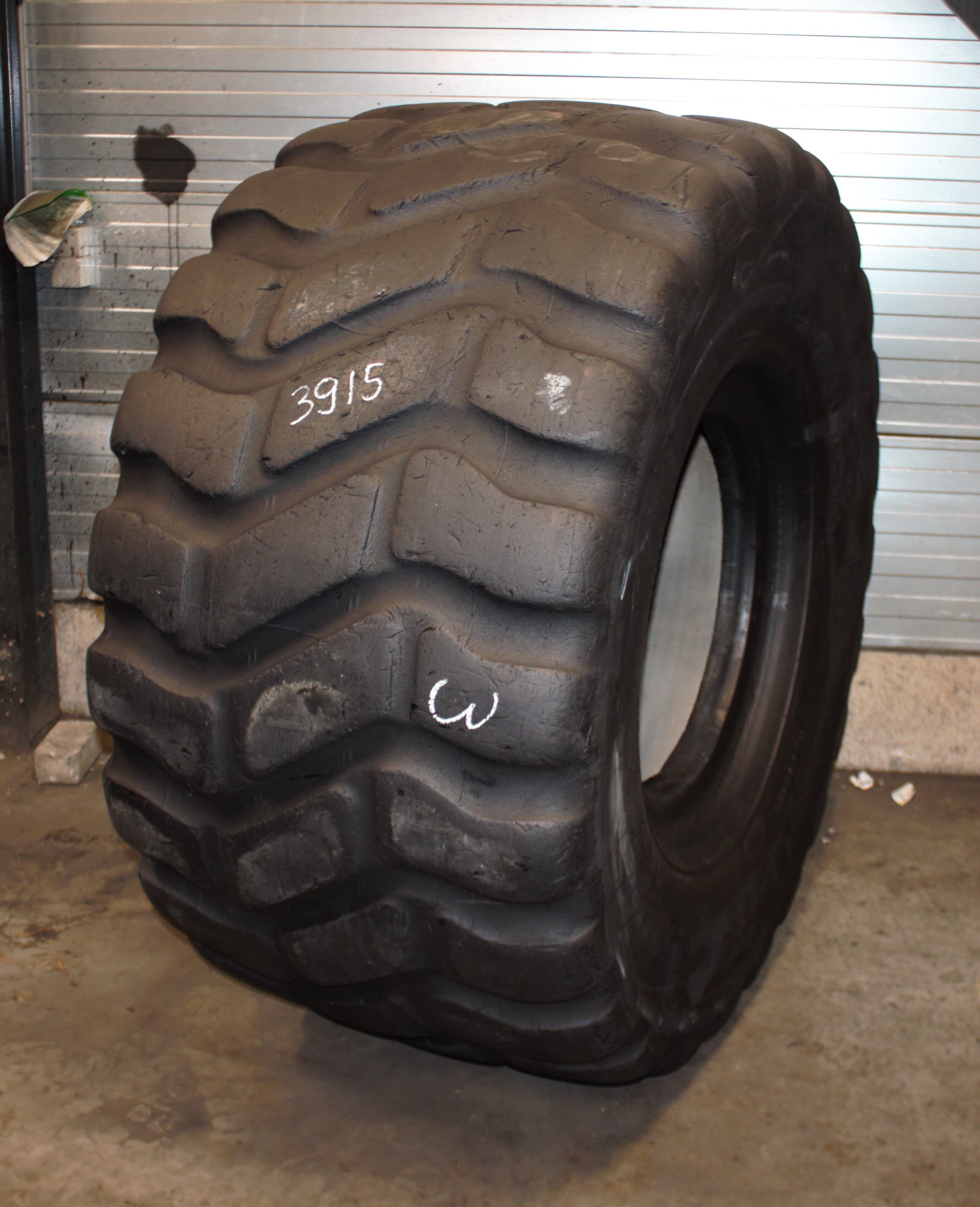 750/65R25 USED GOODYEAR TL-3A+ 202A2 ** E-3/L-3 TL 21MM 45% 1 REP ...
